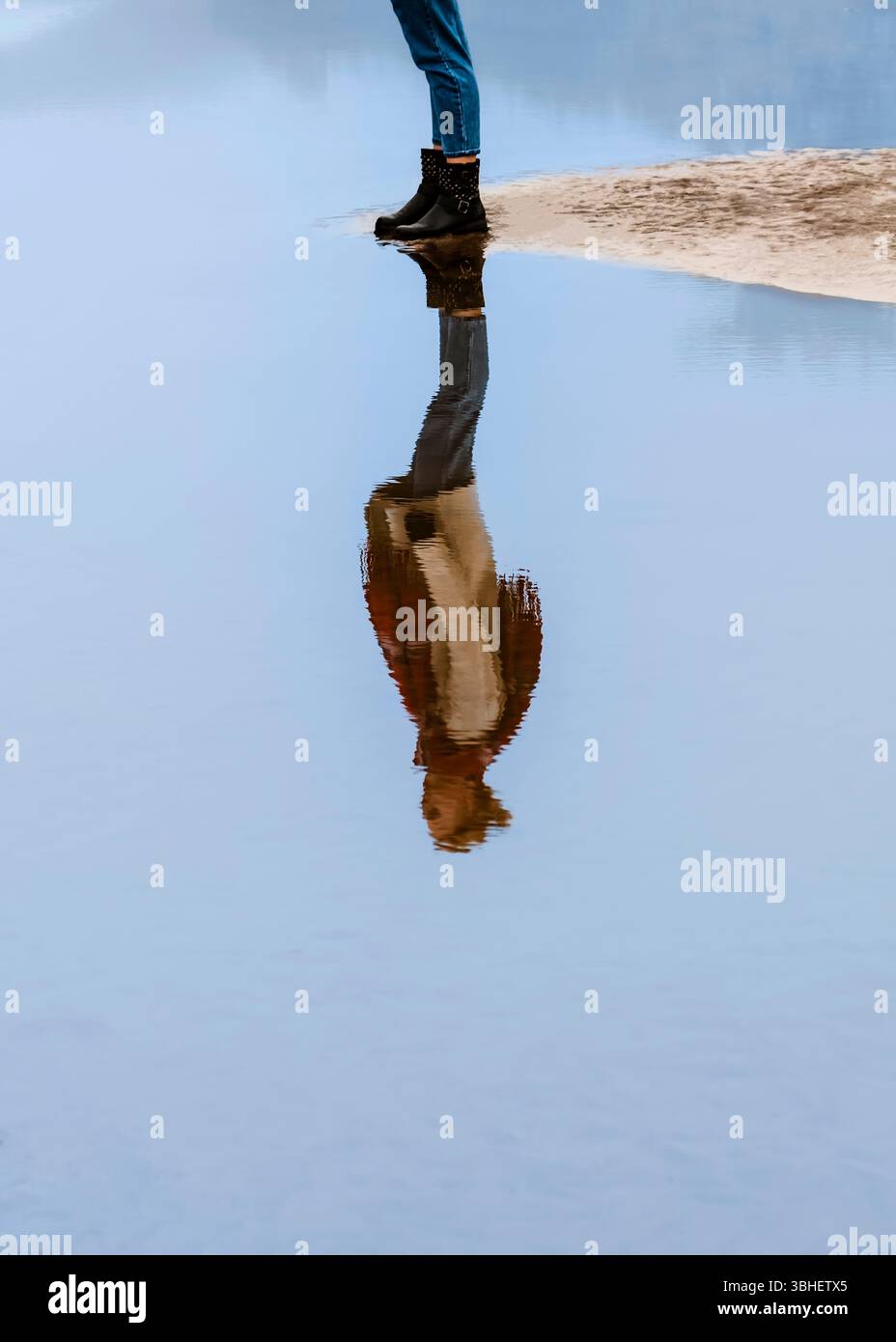 Barefoot person in jeans stands hi-res stock photography and images - Alamy