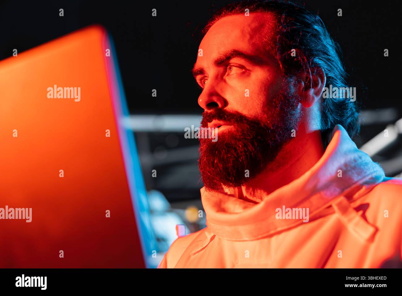 Spaceship Engineer Using Notebook Device To Fix Security Breach Causing Alarm To Sound Space