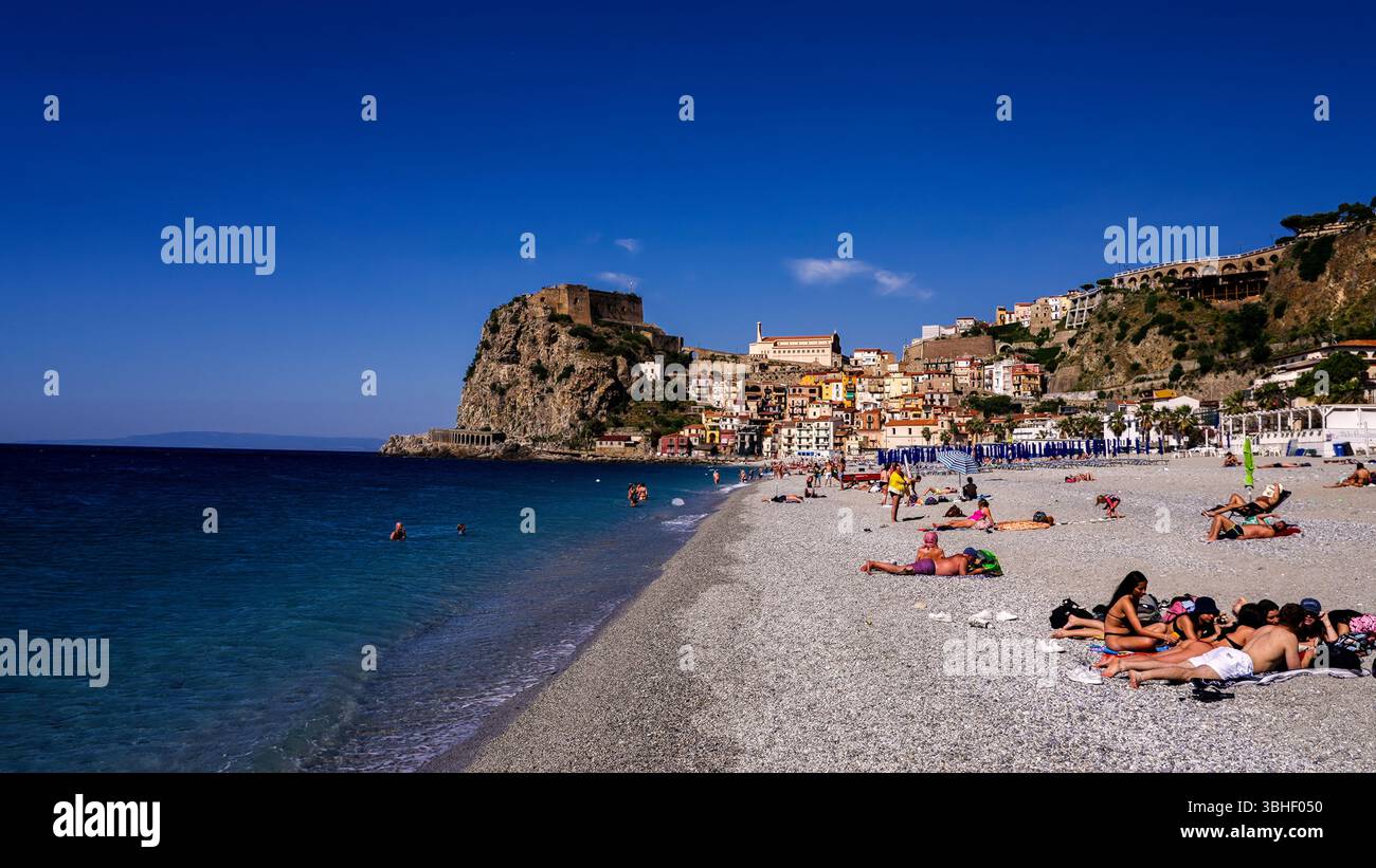 SCILLA, ITALY - JUNE 4, 2025 - Tourists sunbathing and swimming on the ...