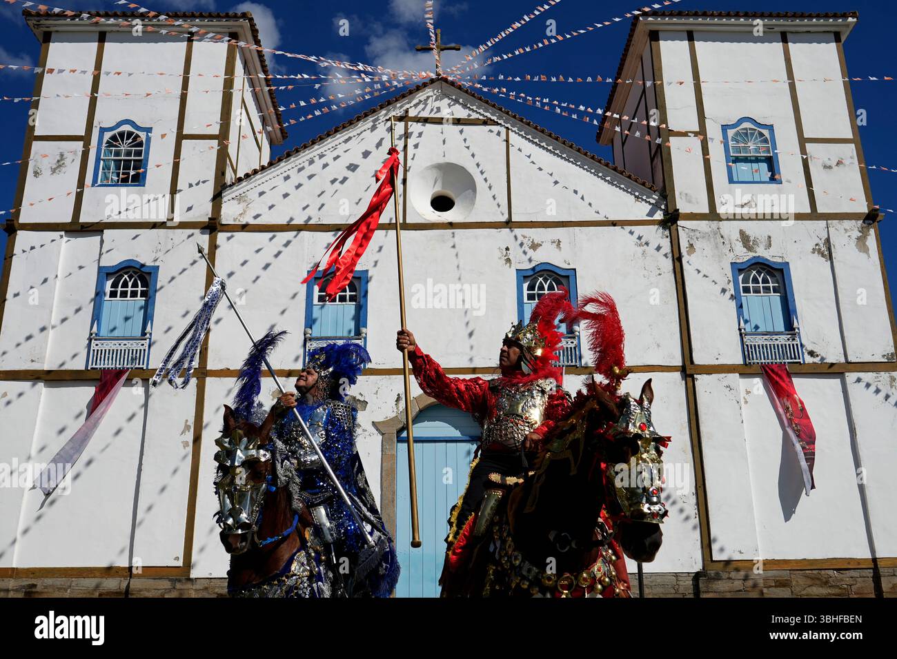 Moorish, right, and Christian kings sit on horses in front of Our Lady ...