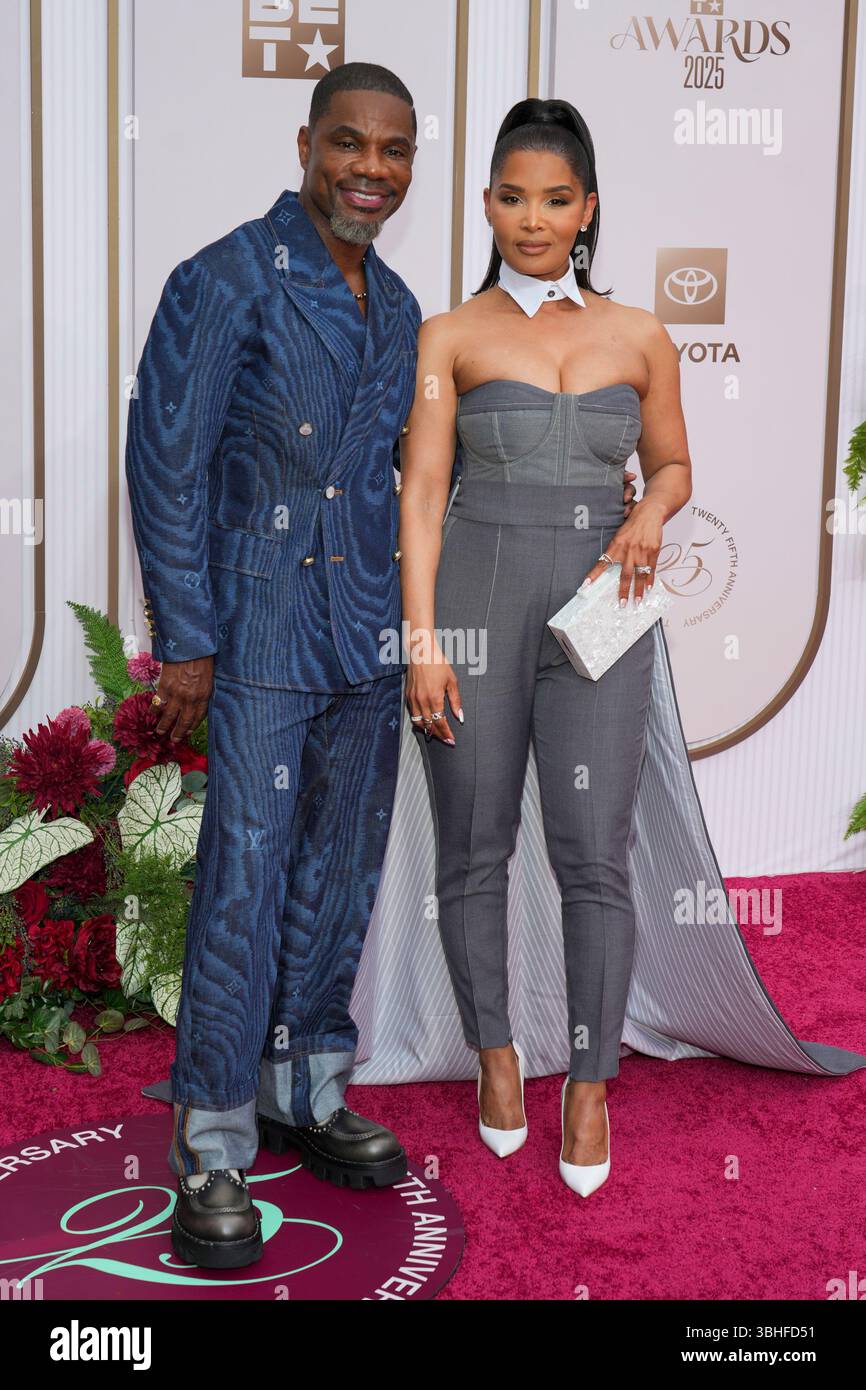 Kirk Franklin, left, and Tammy Collins arrives at the BET Awards on ...