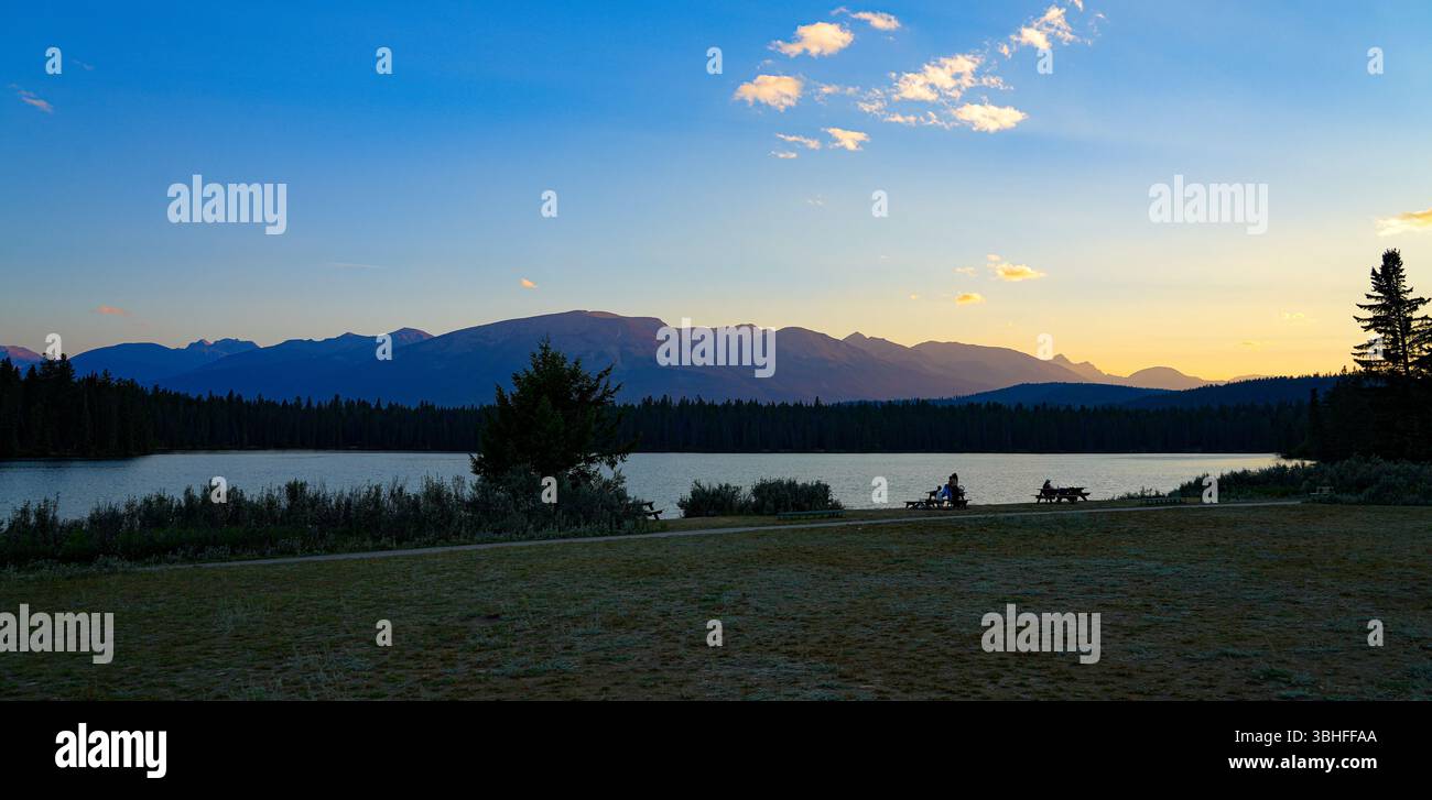 Lake Annette Beach at sunset in the Jasper National Park before the ...