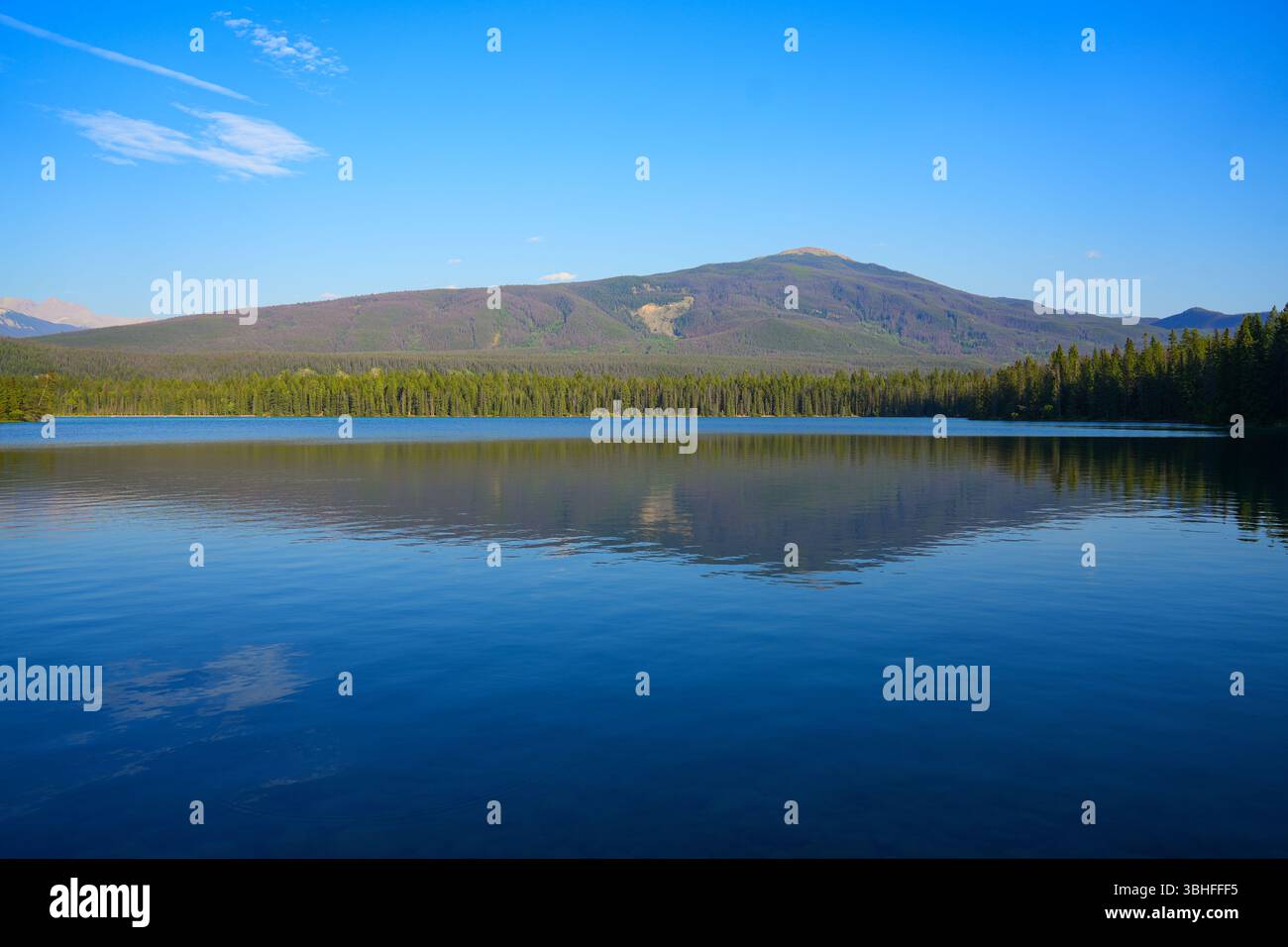 Lake Annette overlooked by Mount Tekarra in the Jasper National Park ...
