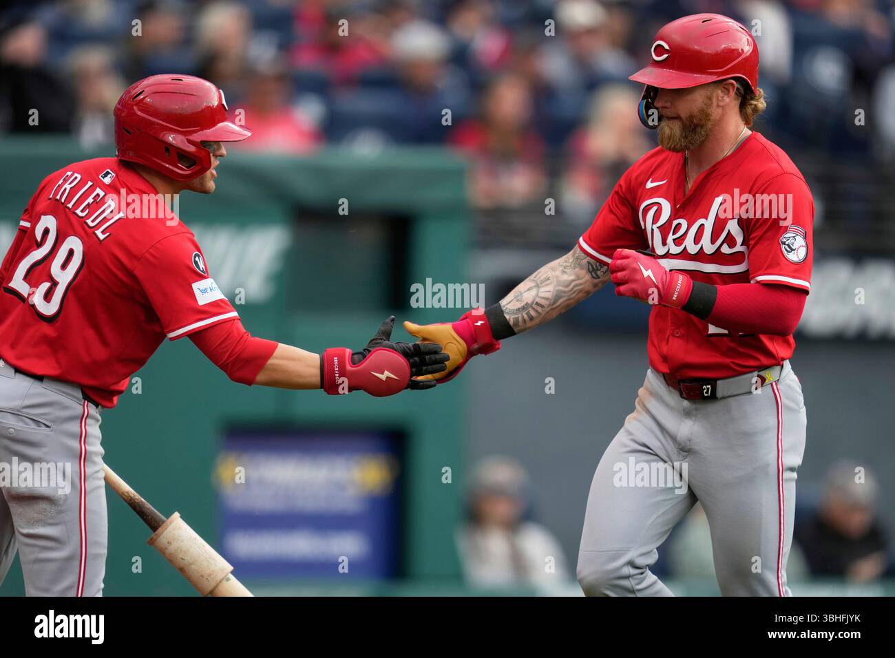 Cincinnati Reds' Jake Fraley, right, is congratulated by teammate TJ ...