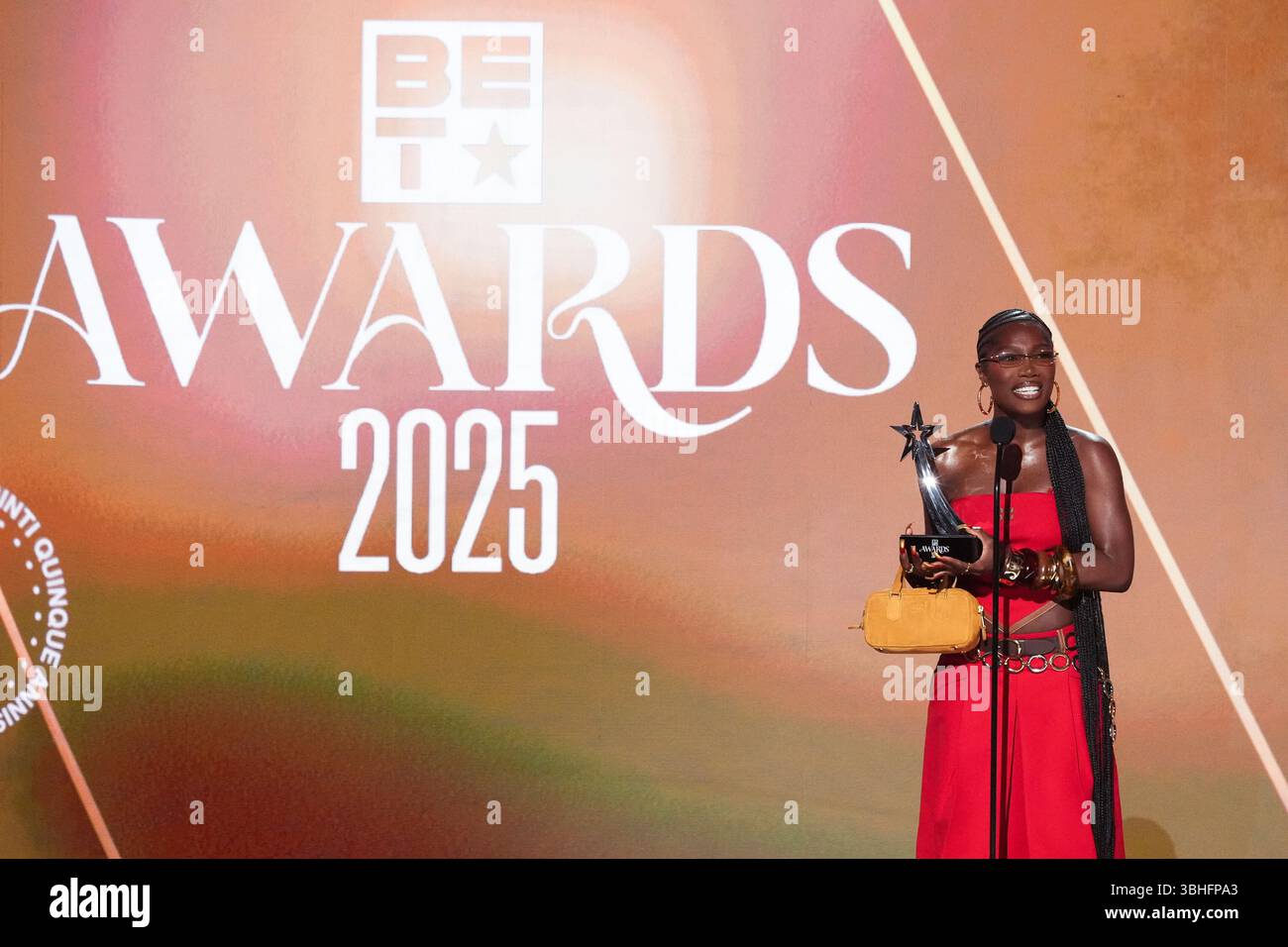Doechii accepts the award for best female hip hop artist during the BET ...