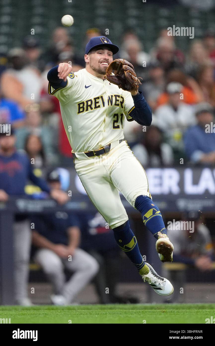Milwaukee Brewers' Caleb Durbin throws to first base during the fourth ...