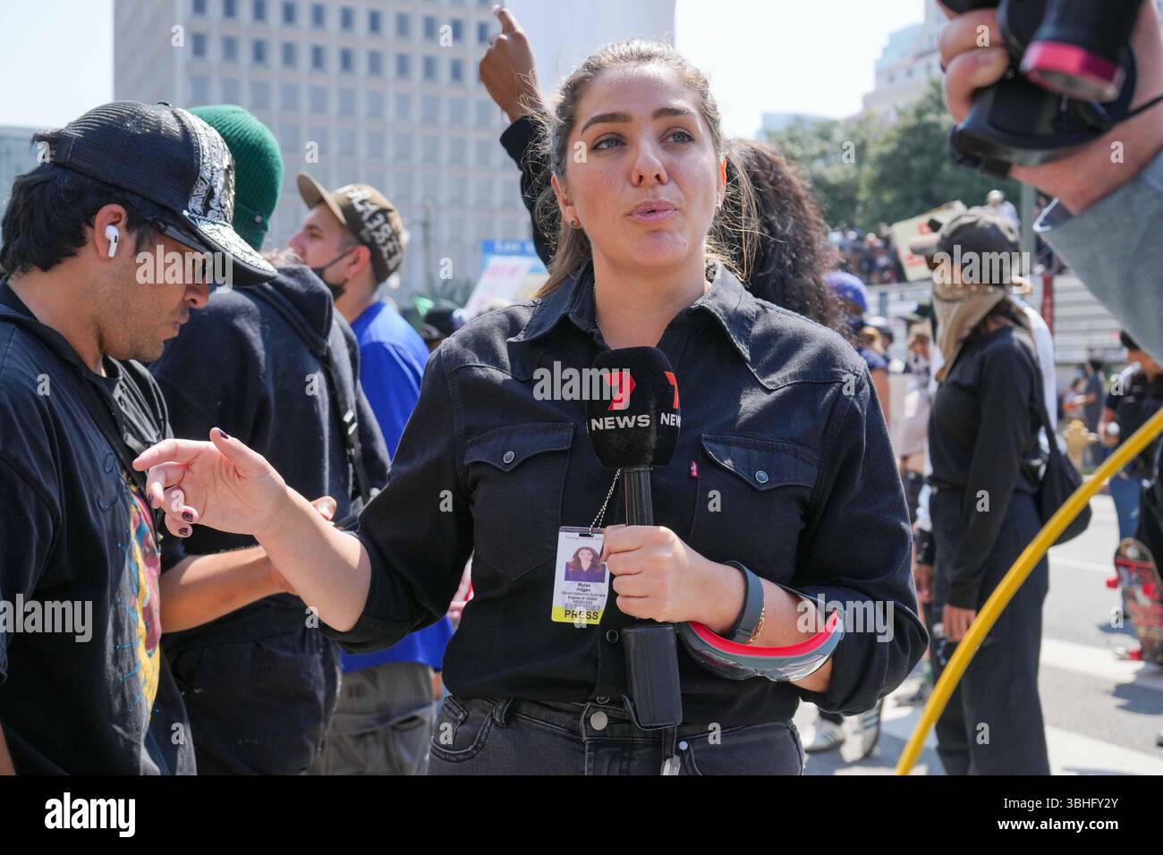 Protestors and California National Guard gather outside the Edward R ...