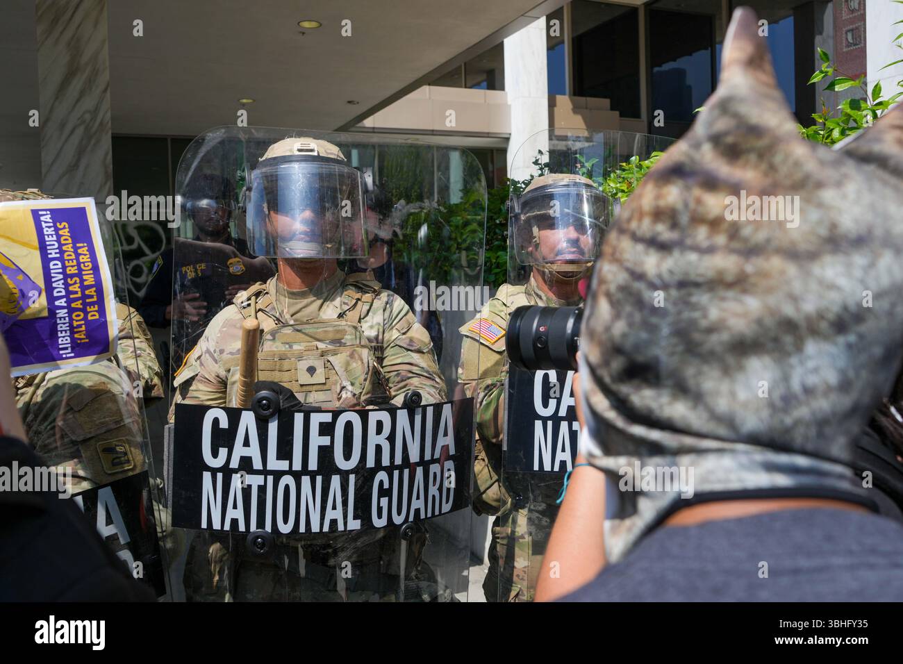 Protestors and California National Guard gather outside the Edward R ...