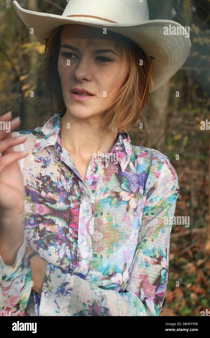 Portrait young cowboy smoking cigar hi-res stock photography and images ...