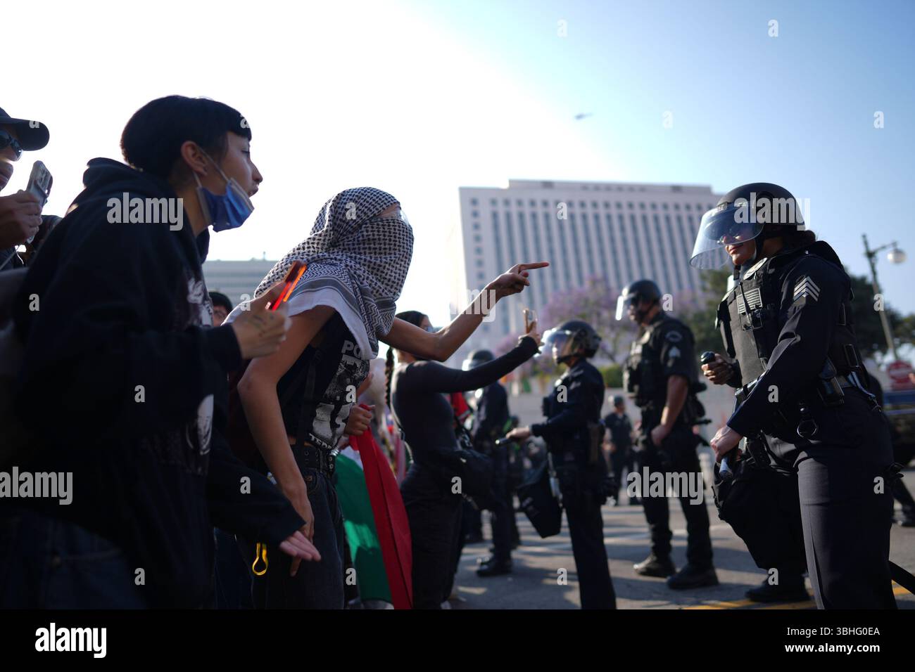 Protesters confront Los Angeles police department personnel in riot ...