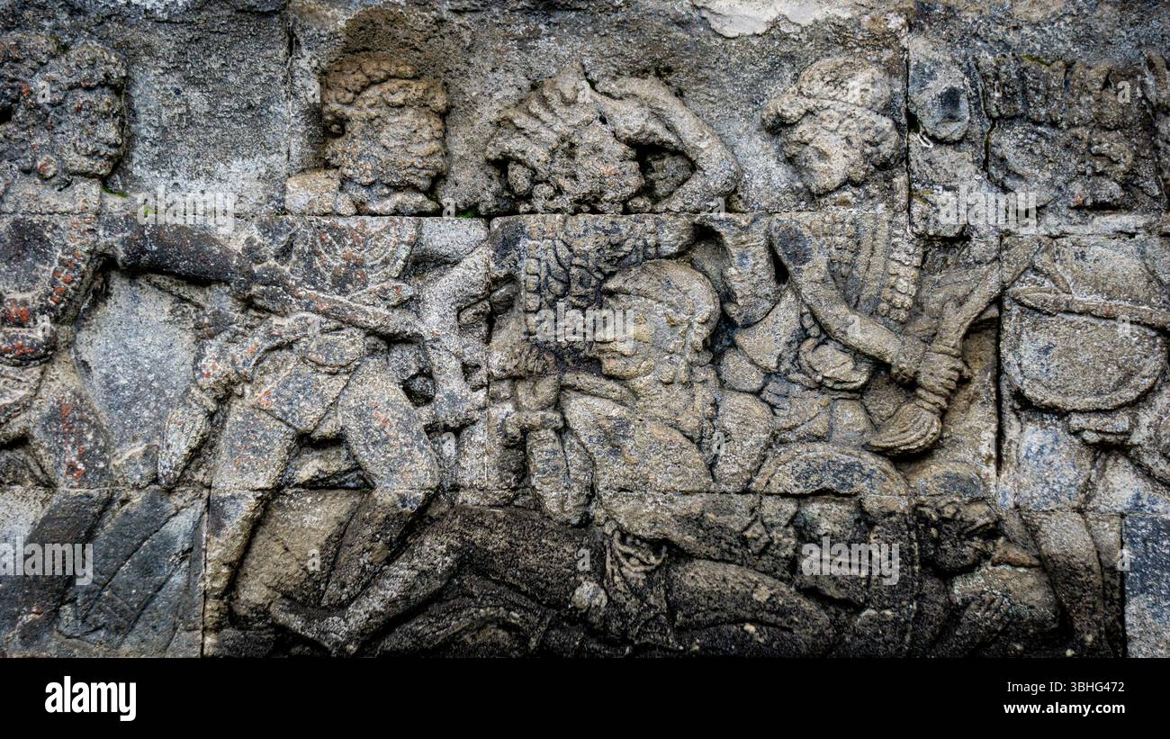 The relief on the wall of Penataran Temple complex Stock Photo - Alamy