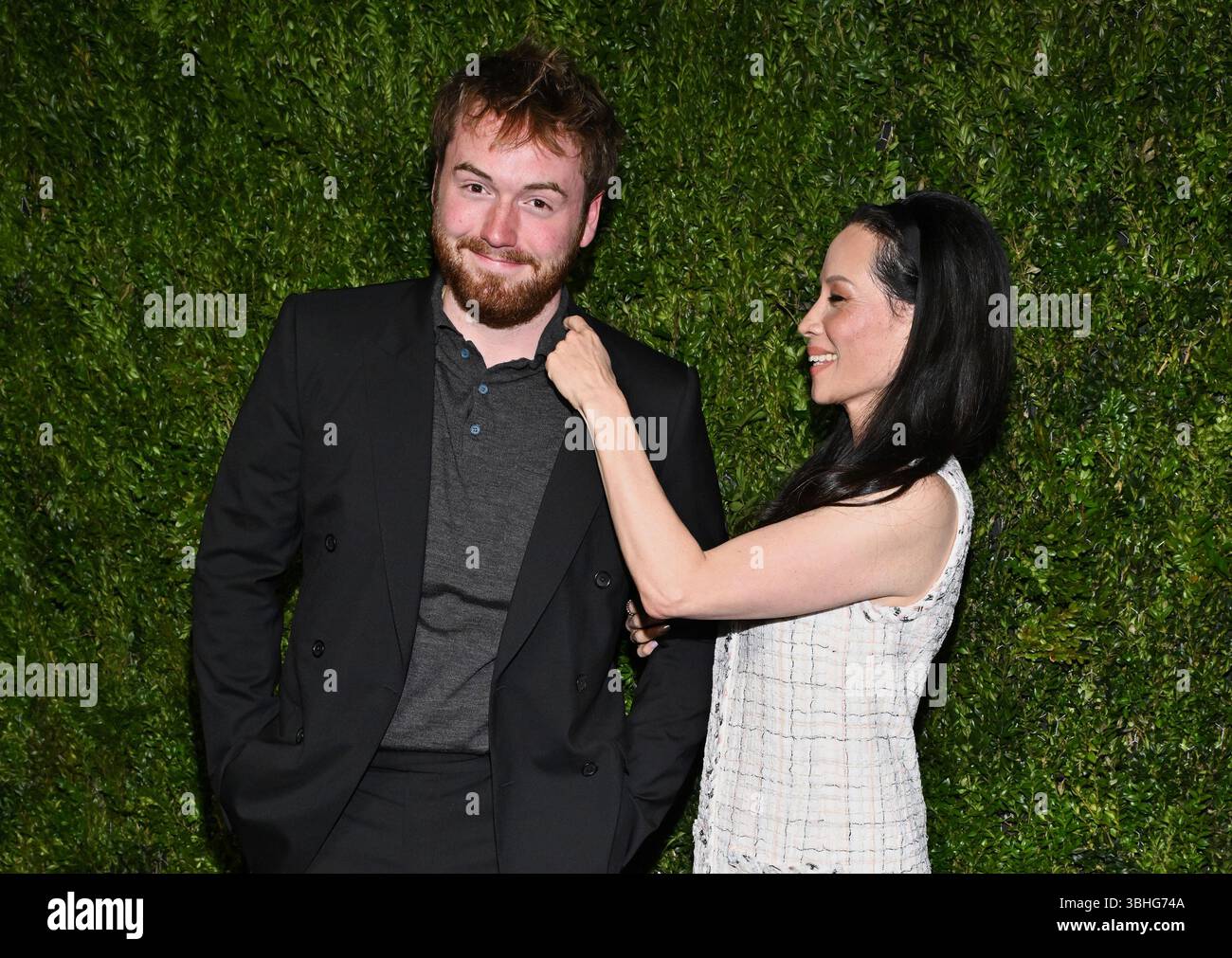 Cooper Hoffman, left, and Lucy Liu attend the 18th annual Tribeca ...
