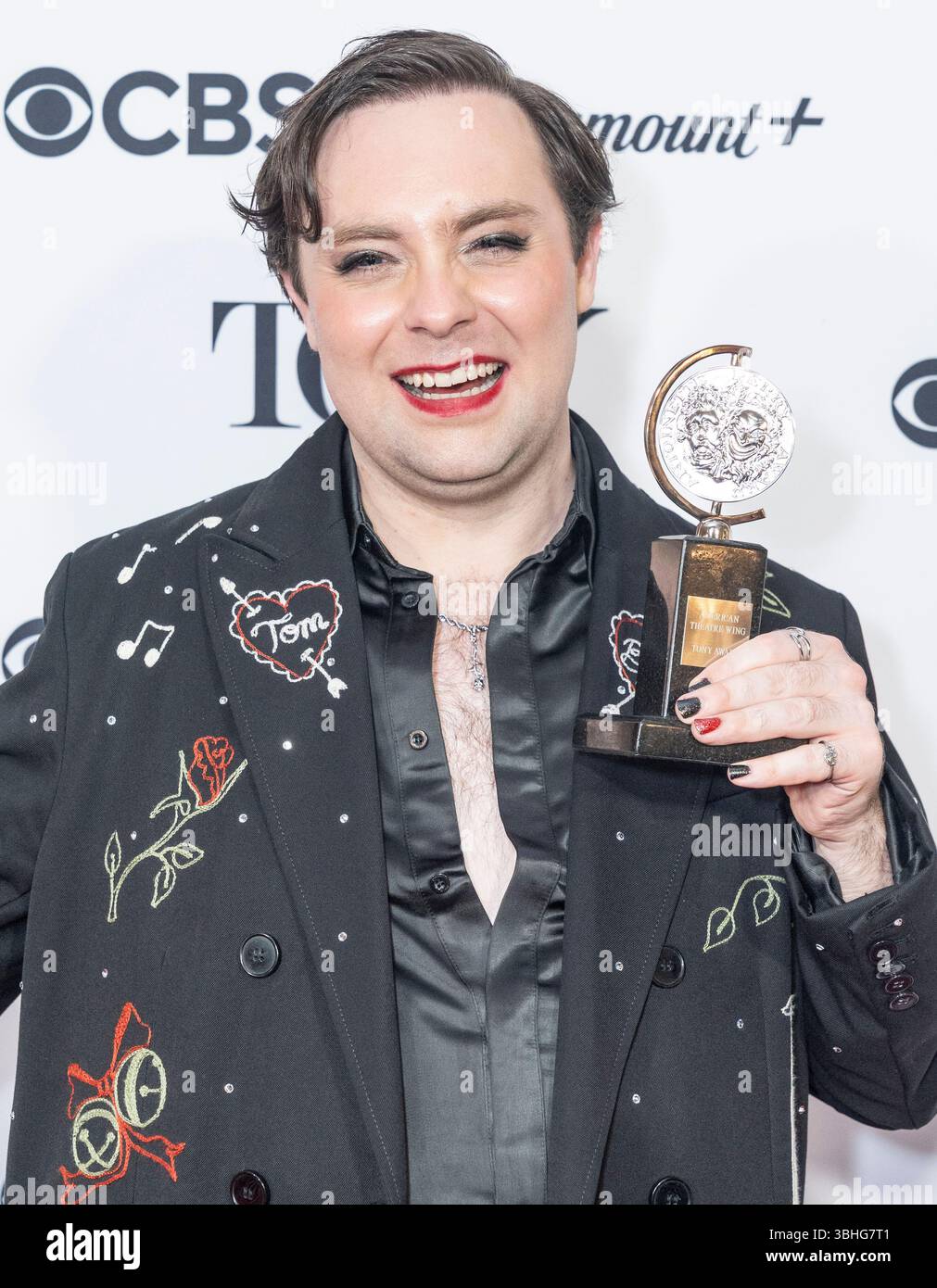 Jak Malone poses with the Best Performance by a Featured Actor in a ...