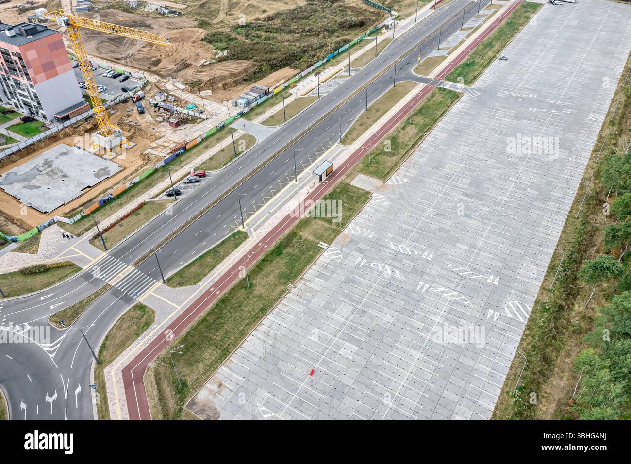 newly constructed large outdoor parking lot in new residential area ...