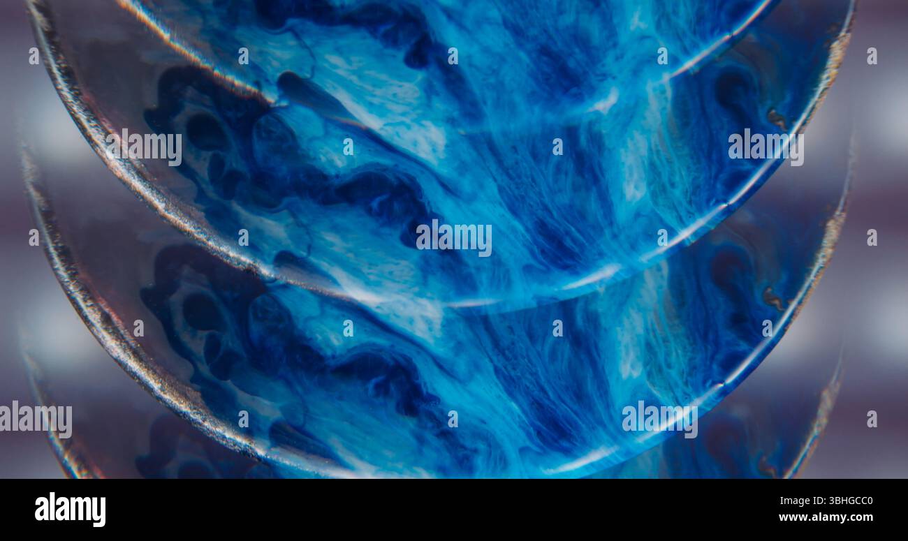 Optical effect paint. Art fluid blur. Blue black acrylic blend color ...