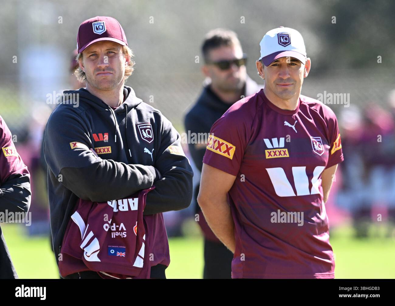 Cameron Munster (left) and Queensland coach Billy Slater (right) are ...