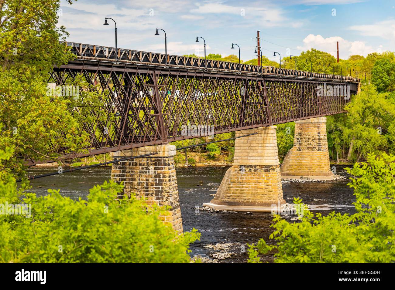 Golden sunset view of the River Lights Bridge at Phoenix Park in Eau Claire Wisconsin Stock ...