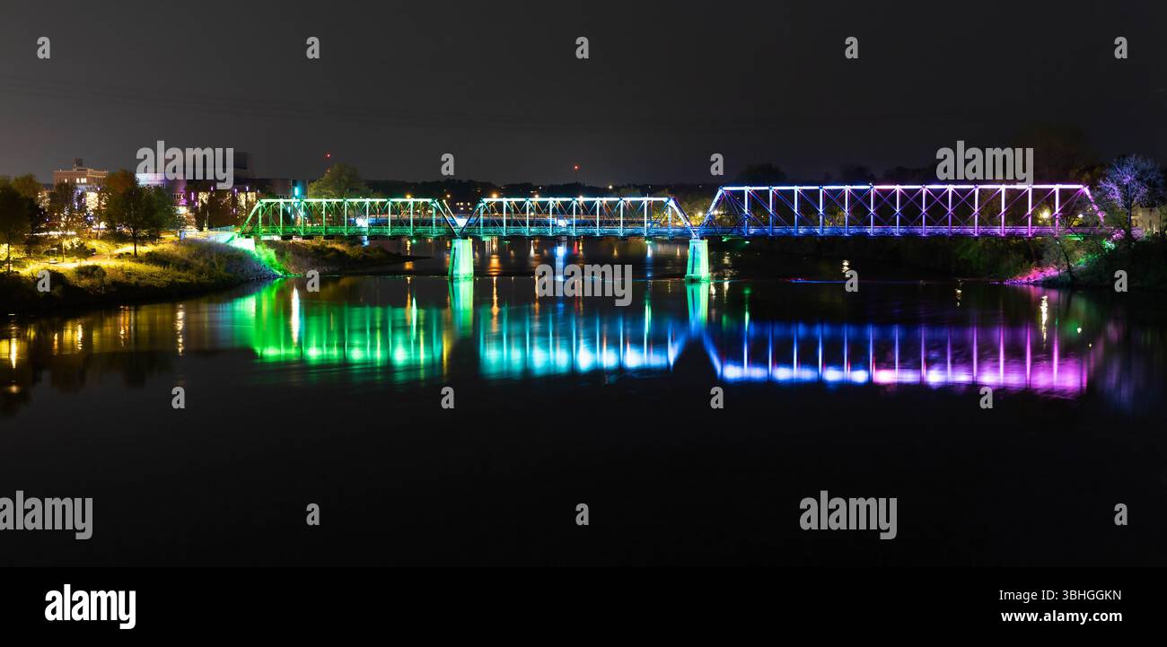 Night view of the River Lights Bridge in Eau Claire Wisconsin glowing ...