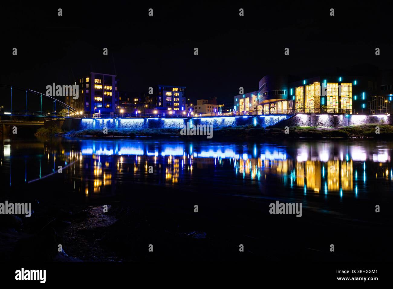 Nighttime view of Haymarket Plaza and Phoenix Park Footbridge in Eau ...