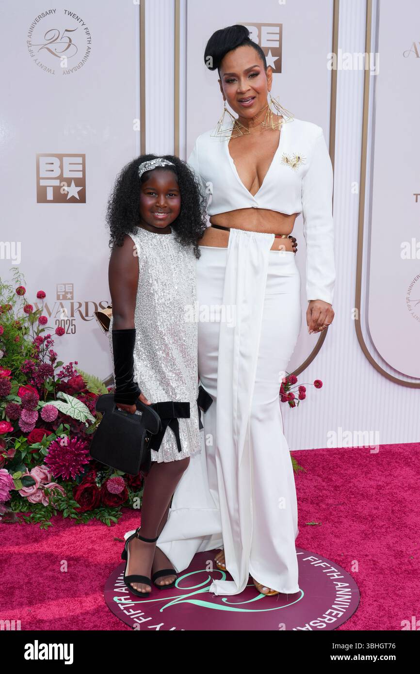 Bella Rae, left, and LisaRaye McCoy arrive at the BET Awards on Monday ...