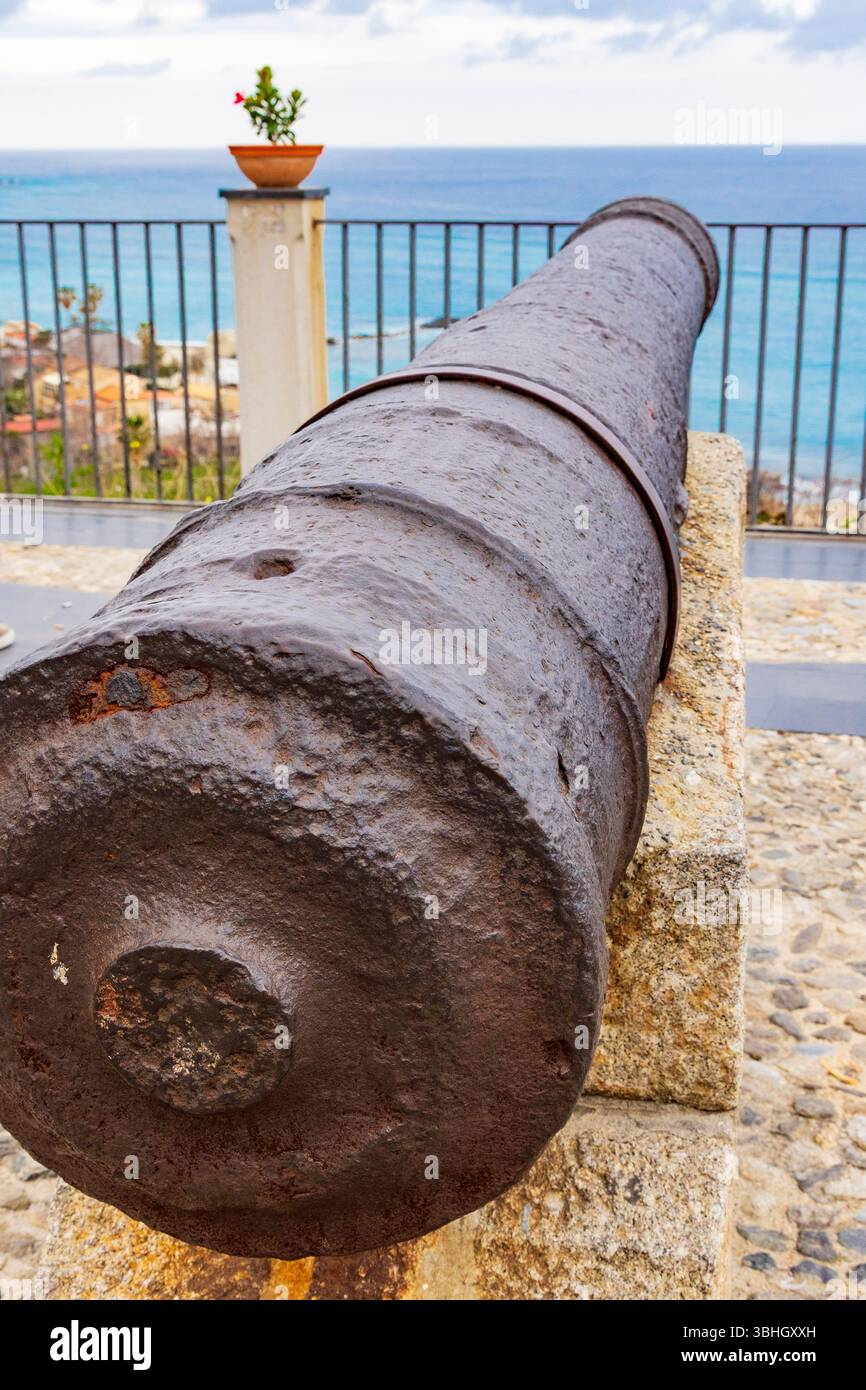 Italy, Calabria, Tropea. Weathered old cannon overlooking the sea in ...