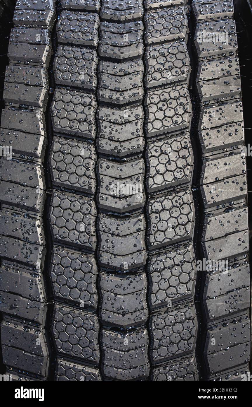 Close-up view of tire showcasing its intricate tread design, vital for ...