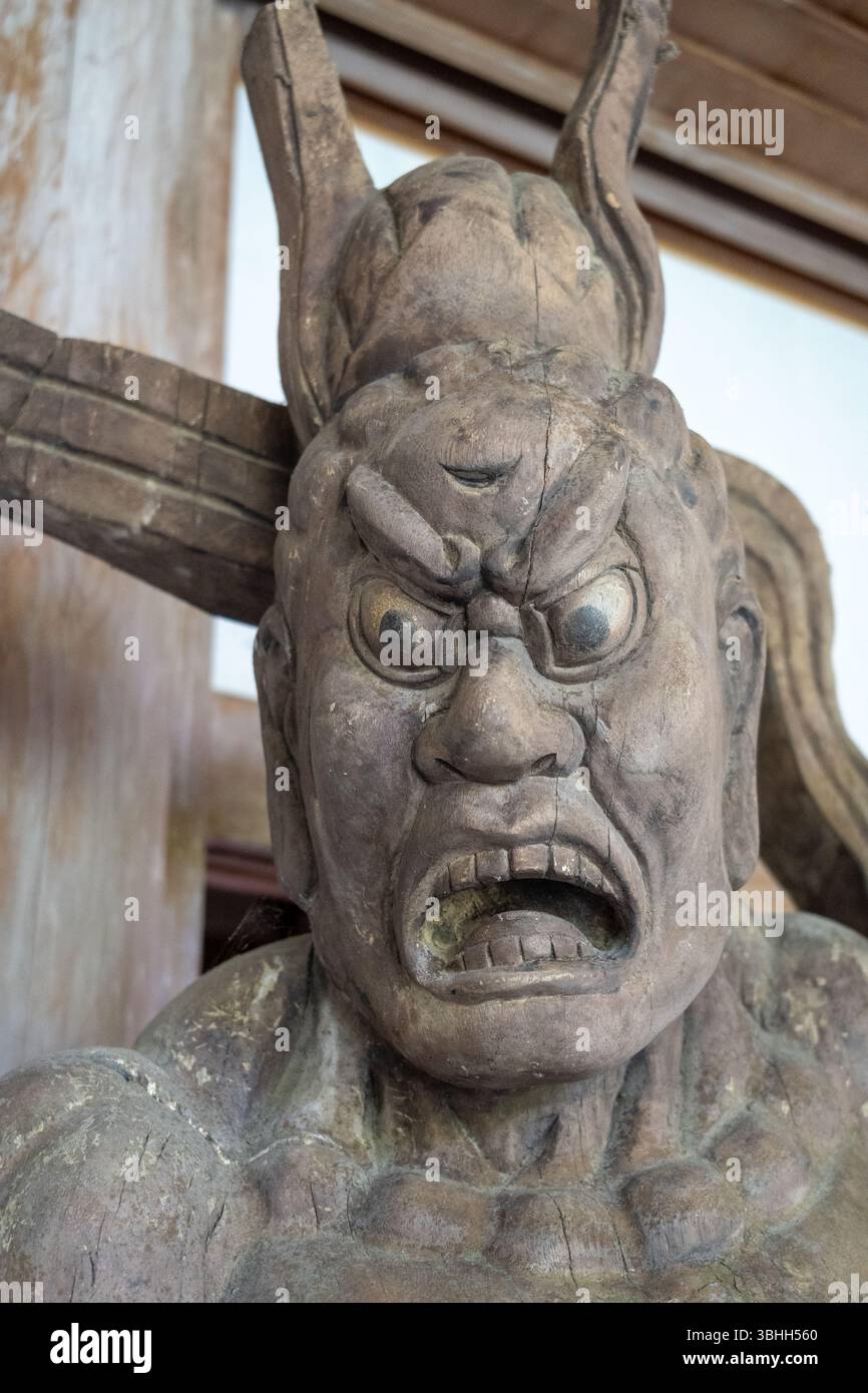 Wooden statue of fierce Nio guardian head, known as Kongorikishi ...