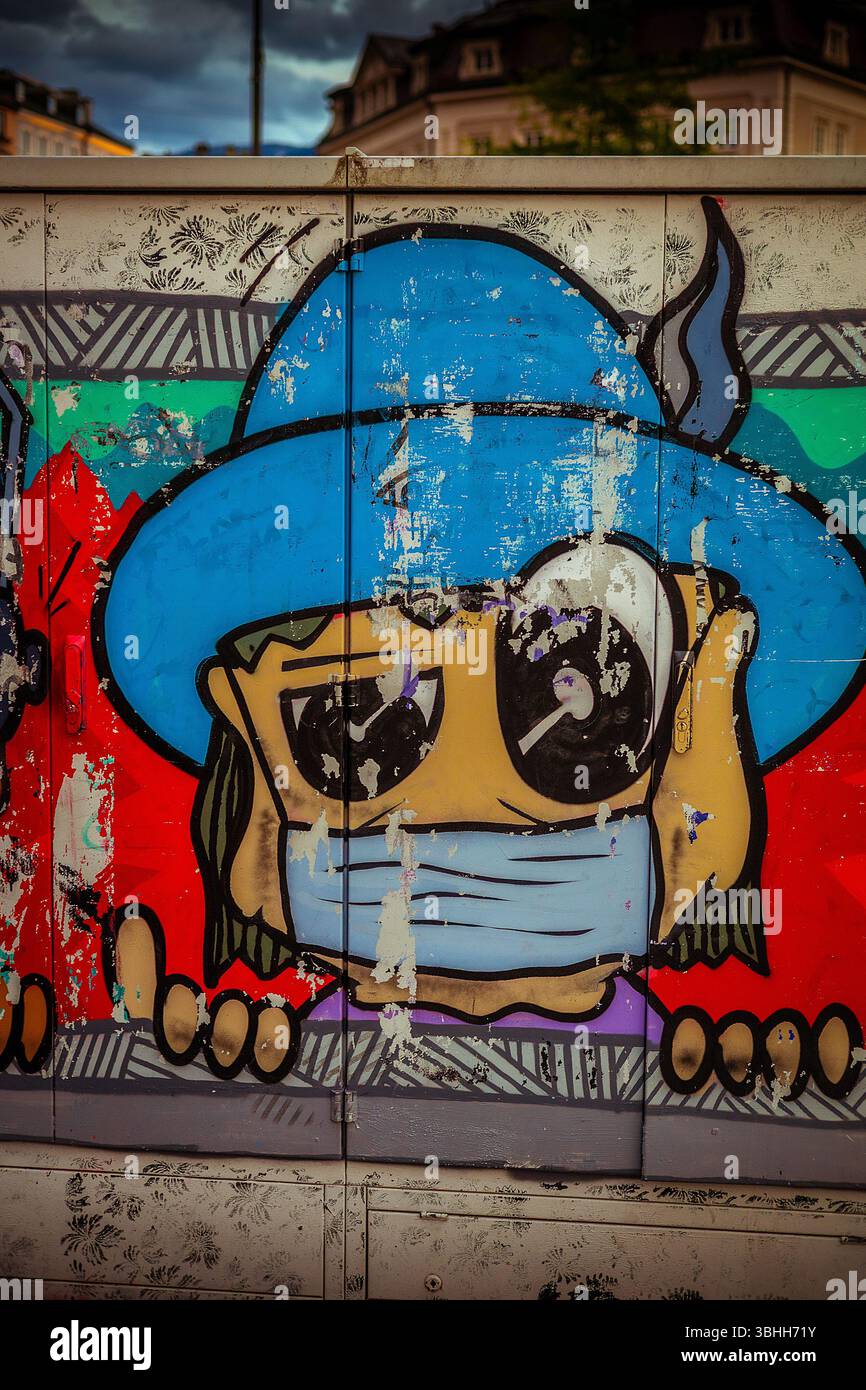 Colorful urban street art in Innsbruck, Austria, depicting a cartoon ...