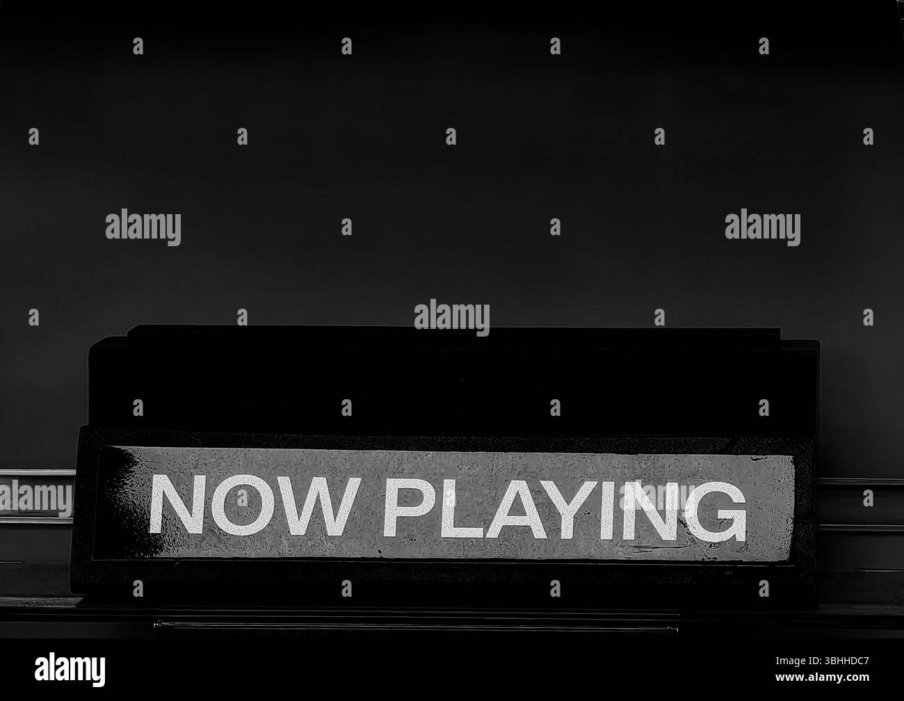 Now Playing – Typography in Focus. Monochrome Hues Stock Photo - Alamy