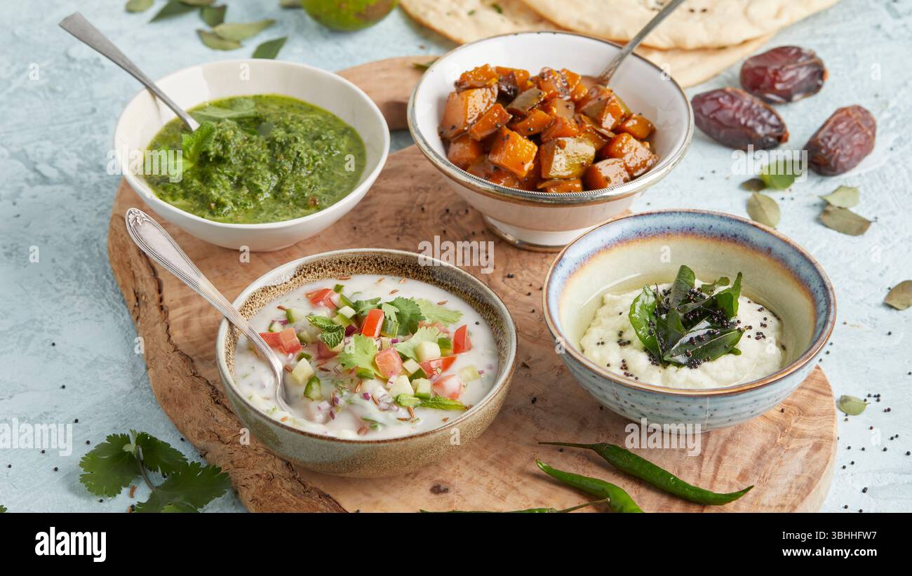 Chutneys and sauces in small bowls – a colorful selection of homemade ...
