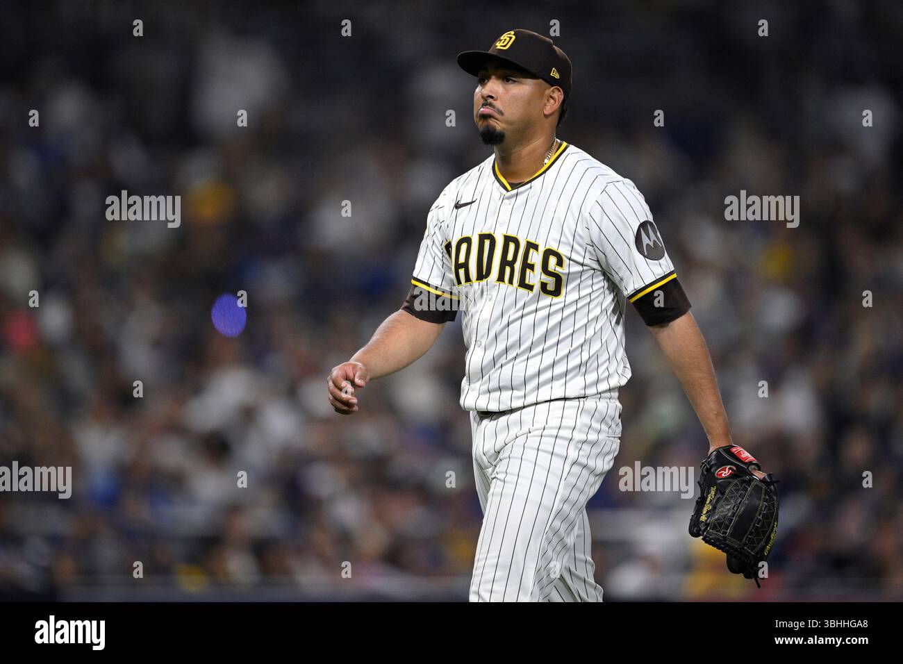 San Diego Padres relief pitcher Jeremiah Estrada reacts after pitching ...