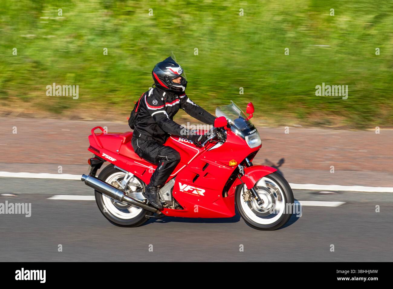 Red Honda VFR 750F, Japanese superbike, Sporty sport tourer, and is powered by a 750 cc V4 ...