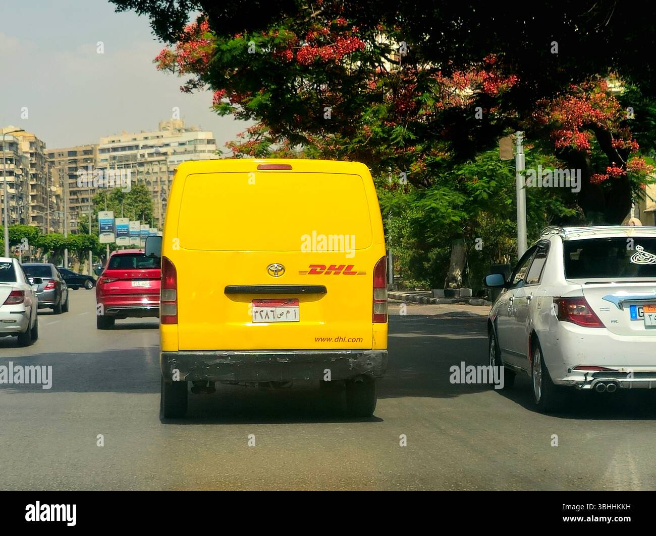 Cairo, Egypt, May 31 2025: DHL van truck on its way delivering a ...