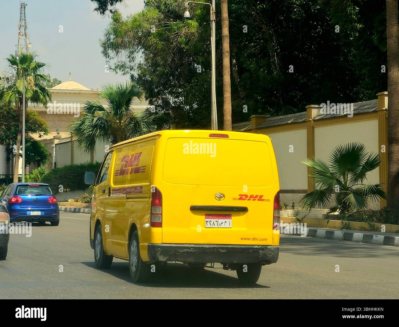 Cairo, Egypt, May 31 2025: DHL van truck on its way delivering a ...