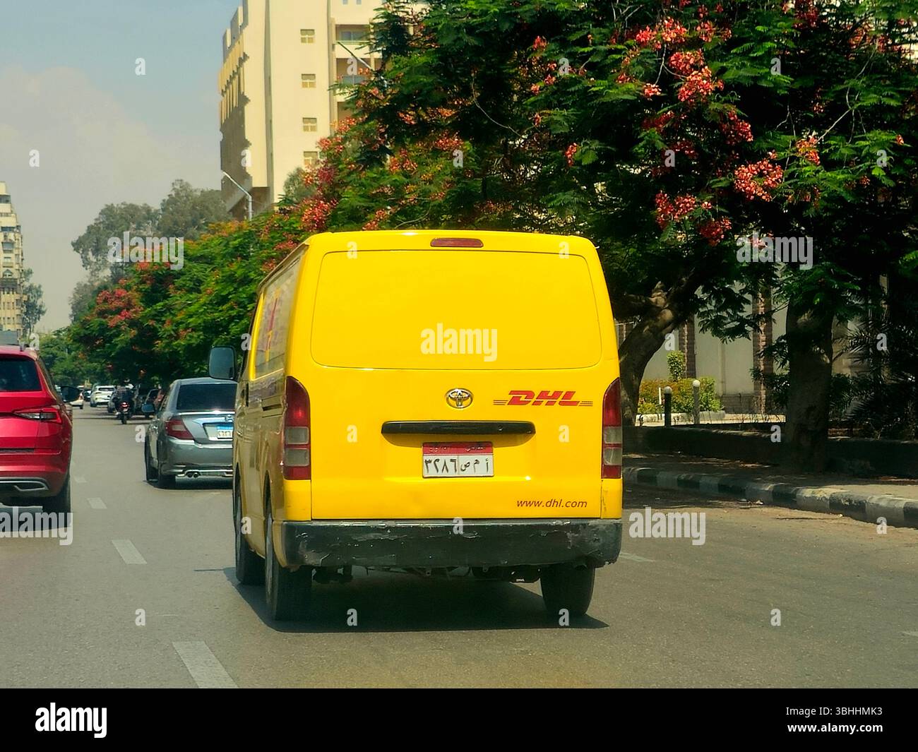 Cairo, Egypt, May 31 2025: DHL van truck on its way delivering a ...