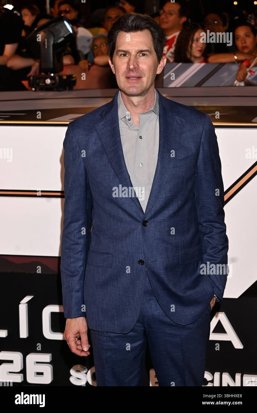 Director Joseph Kosinski poses for photos during the black carpet for ...