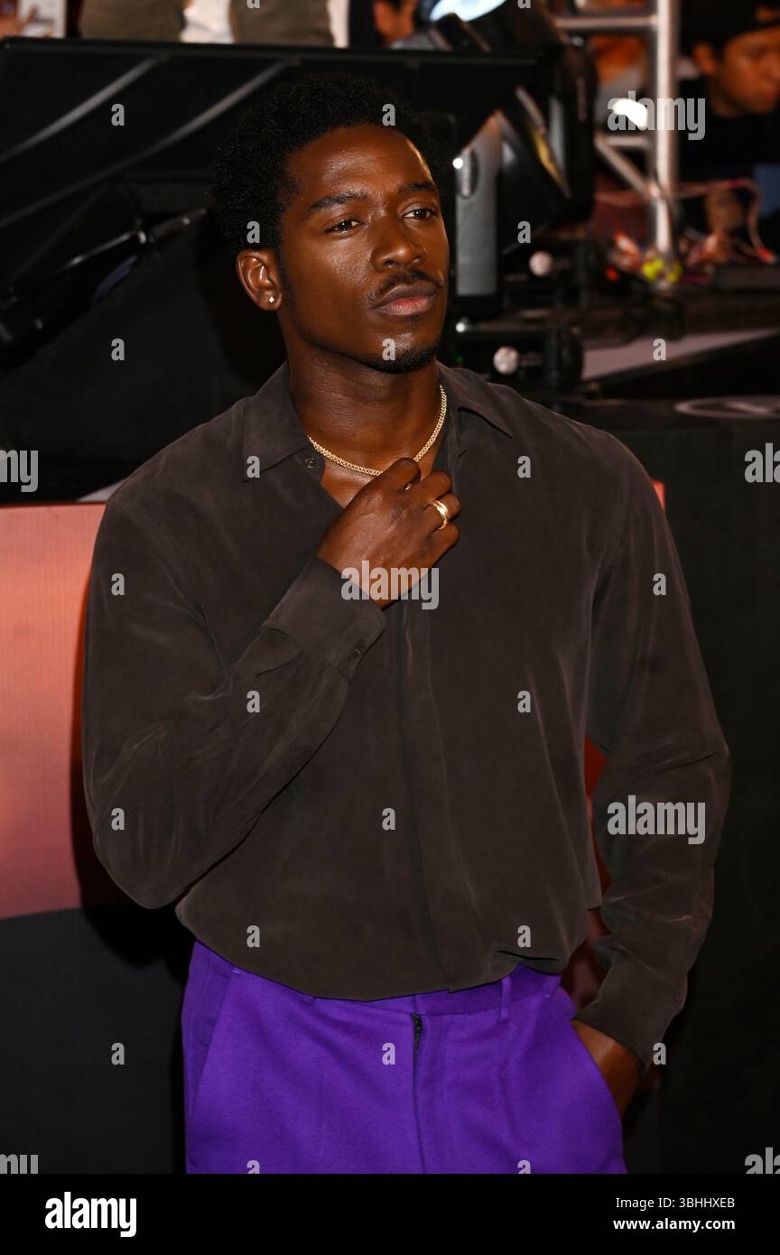 Actor Damson Idris poses for photos during the black carpet for F1: The ...