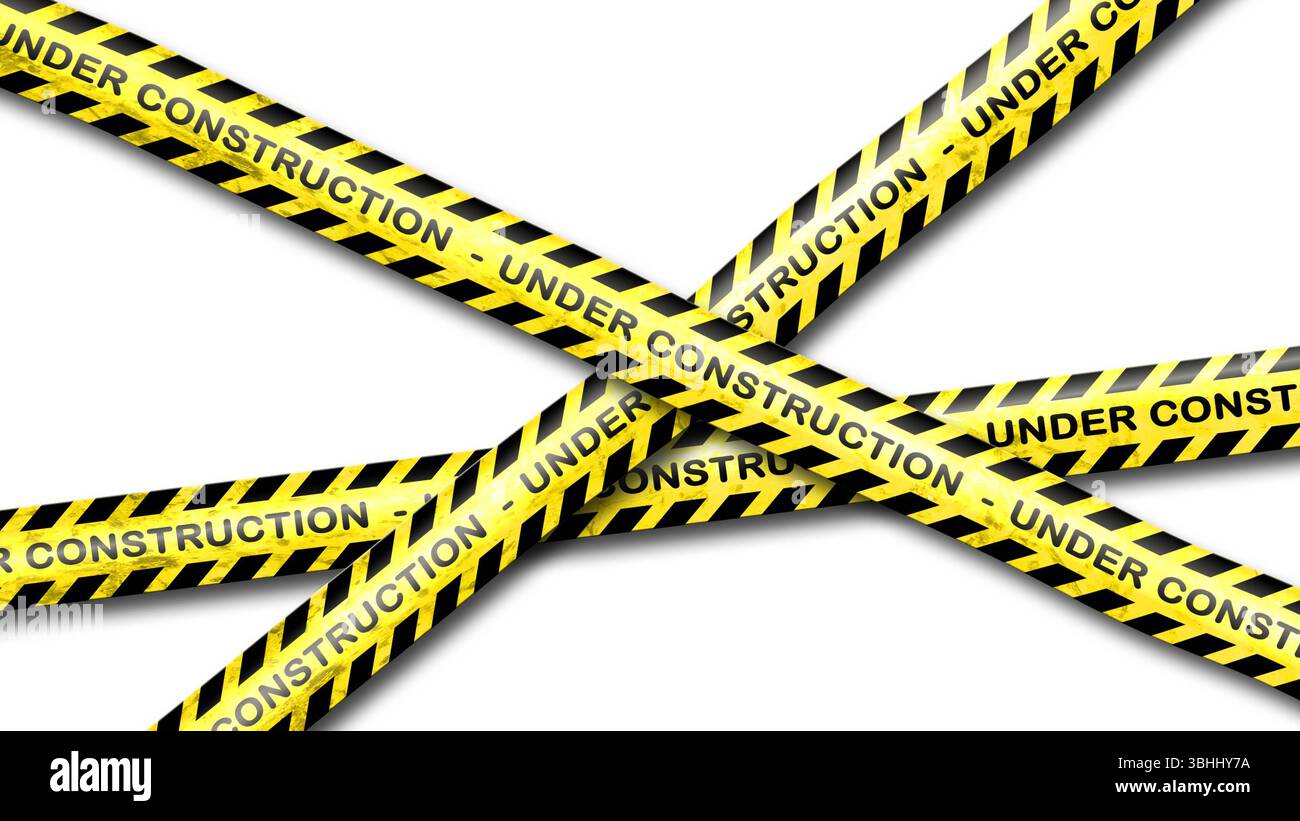 under construction - lettering on barrier tapes in front of white ...