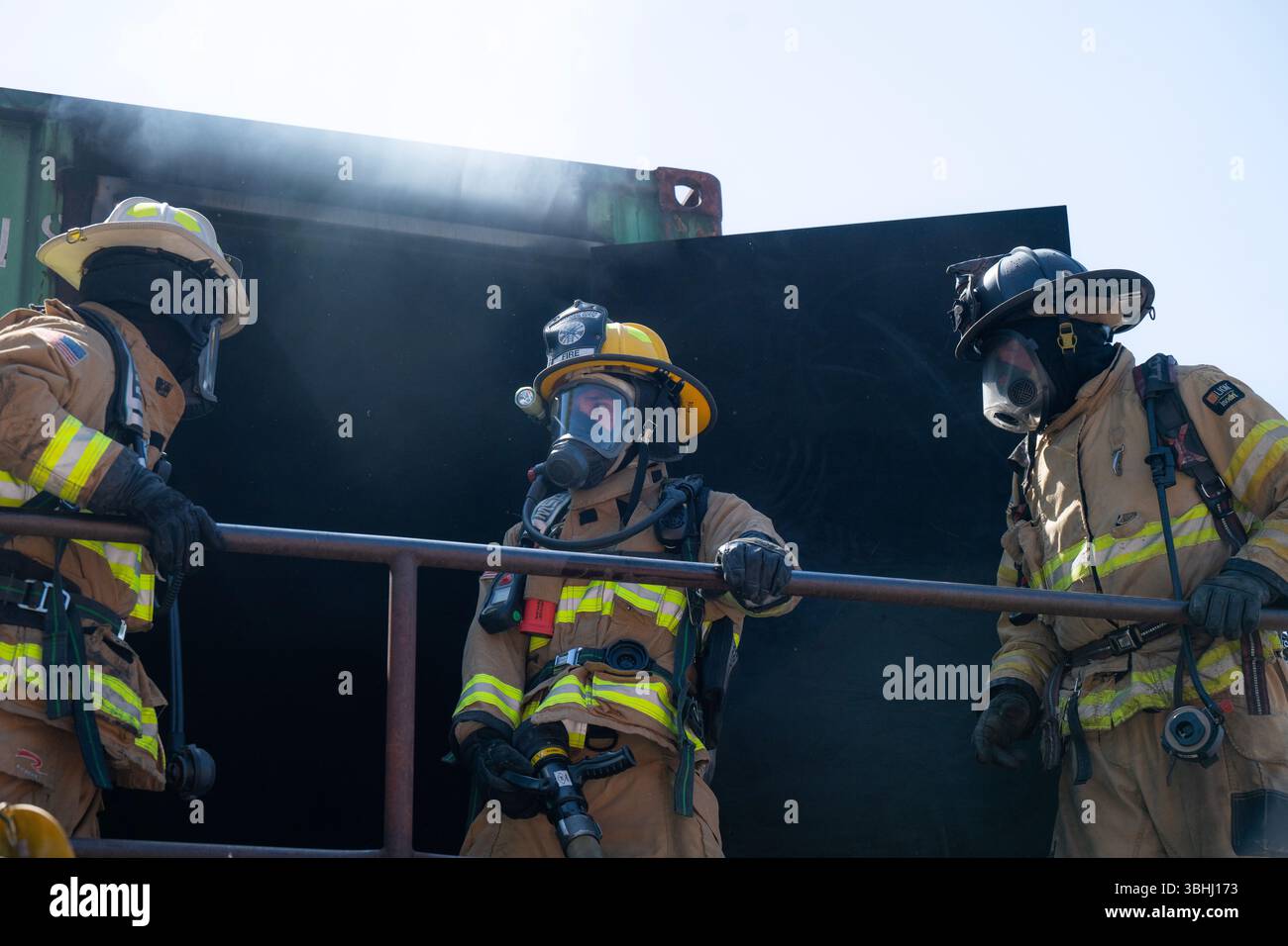 Airmen assigned to the Gowen Field Fire Department practice ...