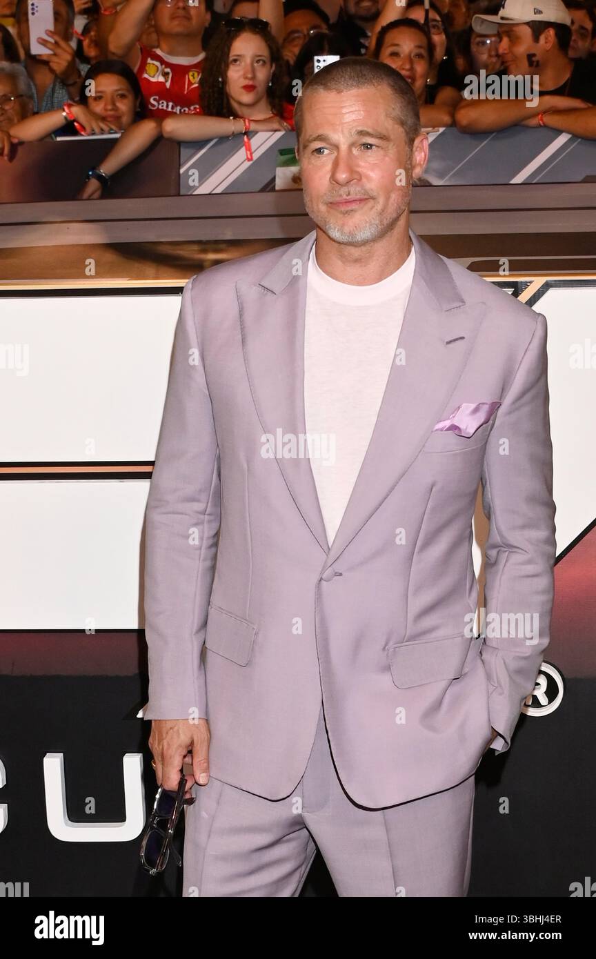 Actor Brad Pitt poses for photos during the black carpet for F1: The ...