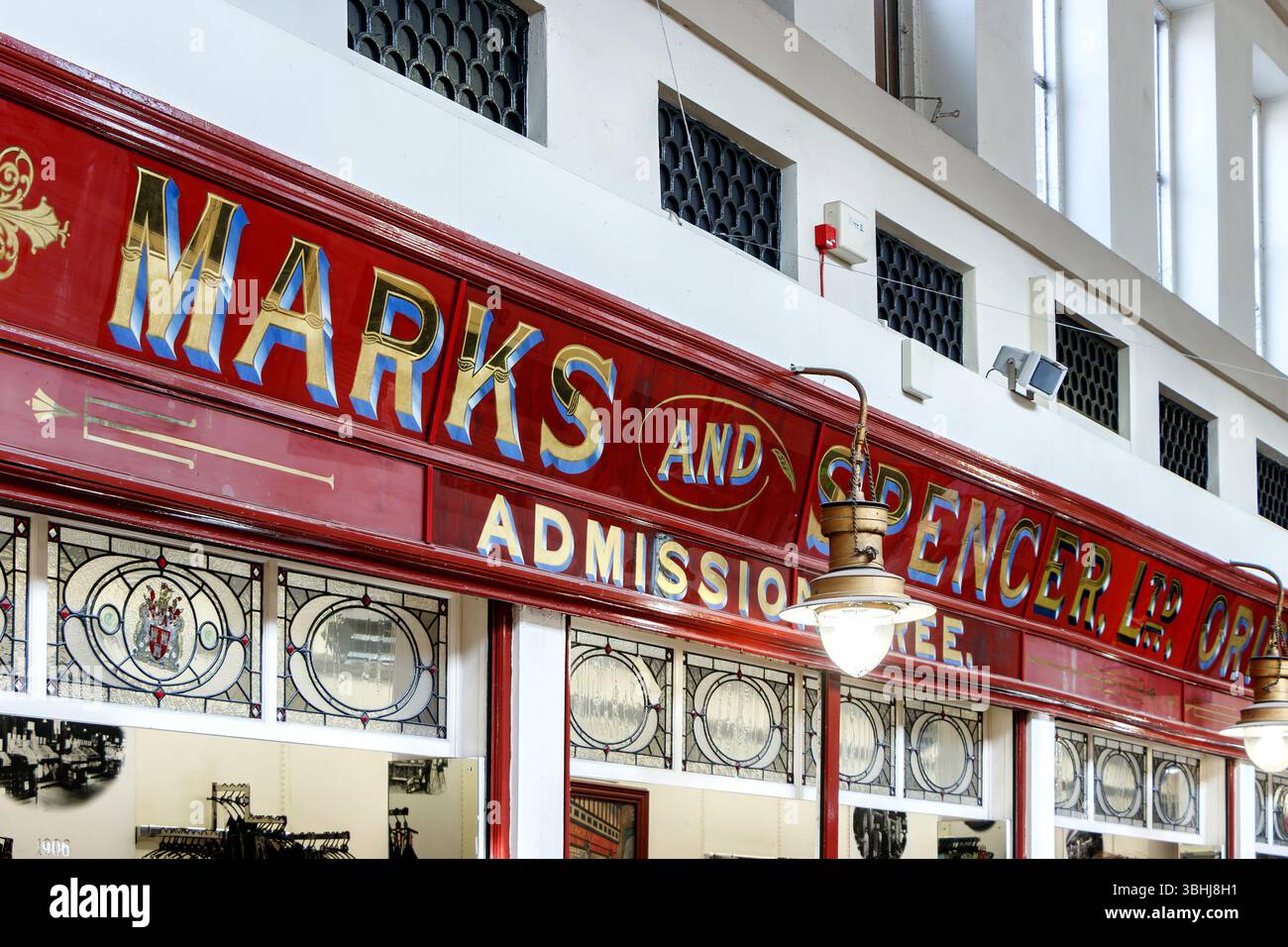 Interior of vintage original Marks & Spencer store with people retro ...