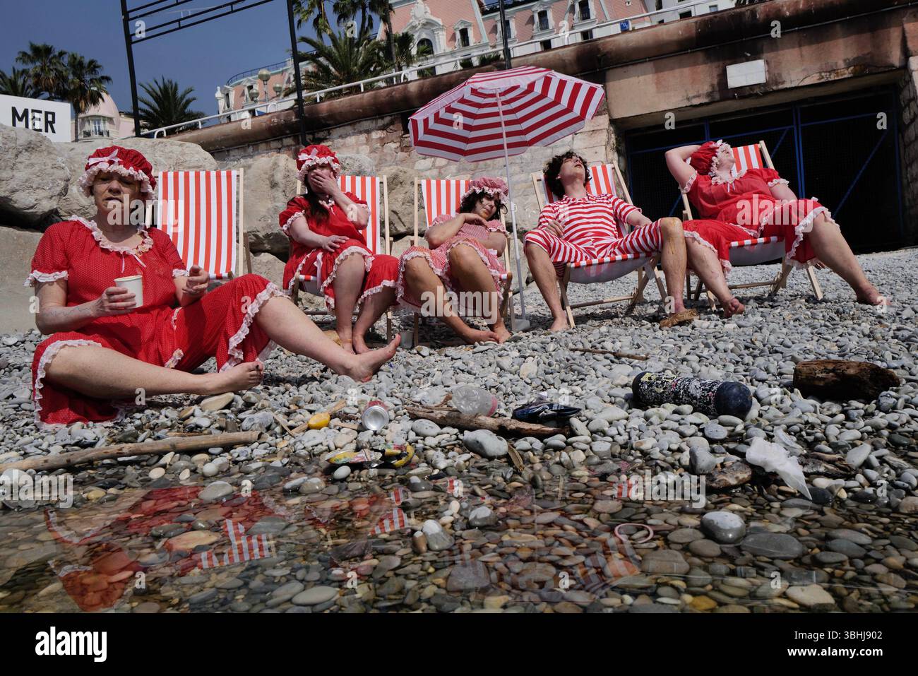 Retro-styled performers dubbed the Bathing Beauties stage a beachside ...
