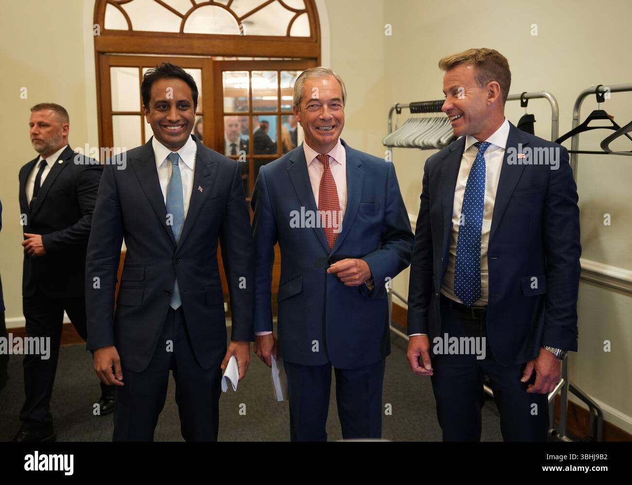 Former chairman Zia Yusuf and Reform UK leader Nigel Farage with his ...