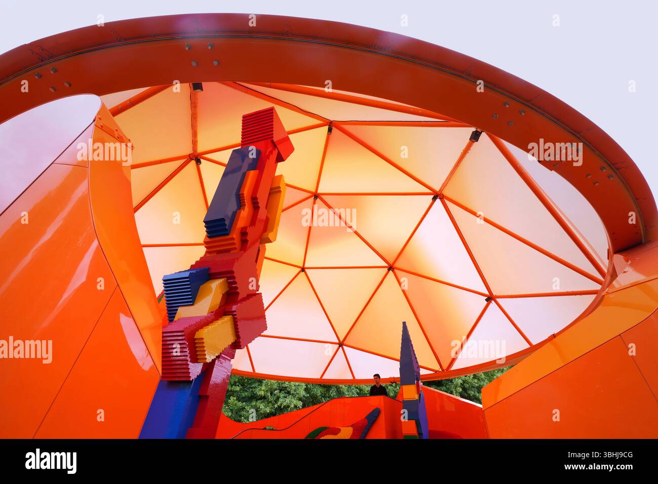 A security guard stands inside the Lego Play Pavilion designed by Peter ...