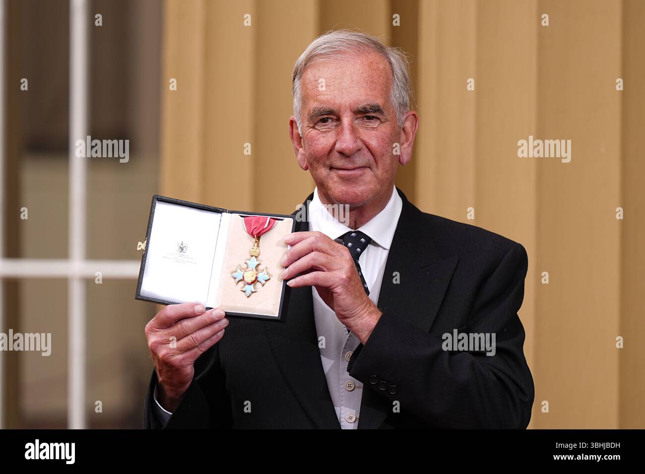 Robert Harris after receiving his MBE during an Investiture ceremony at ...