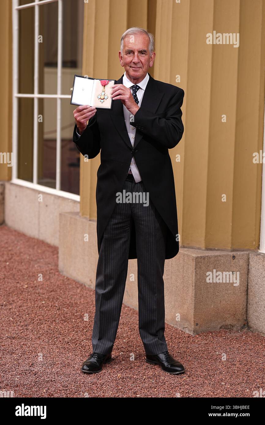 Robert Harris after receiving his MBE during an Investiture ceremony at ...