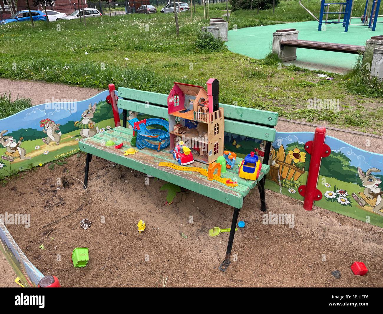 A Vibrantly Colorful Playground Setup Featuring Various Toys Placed in ...