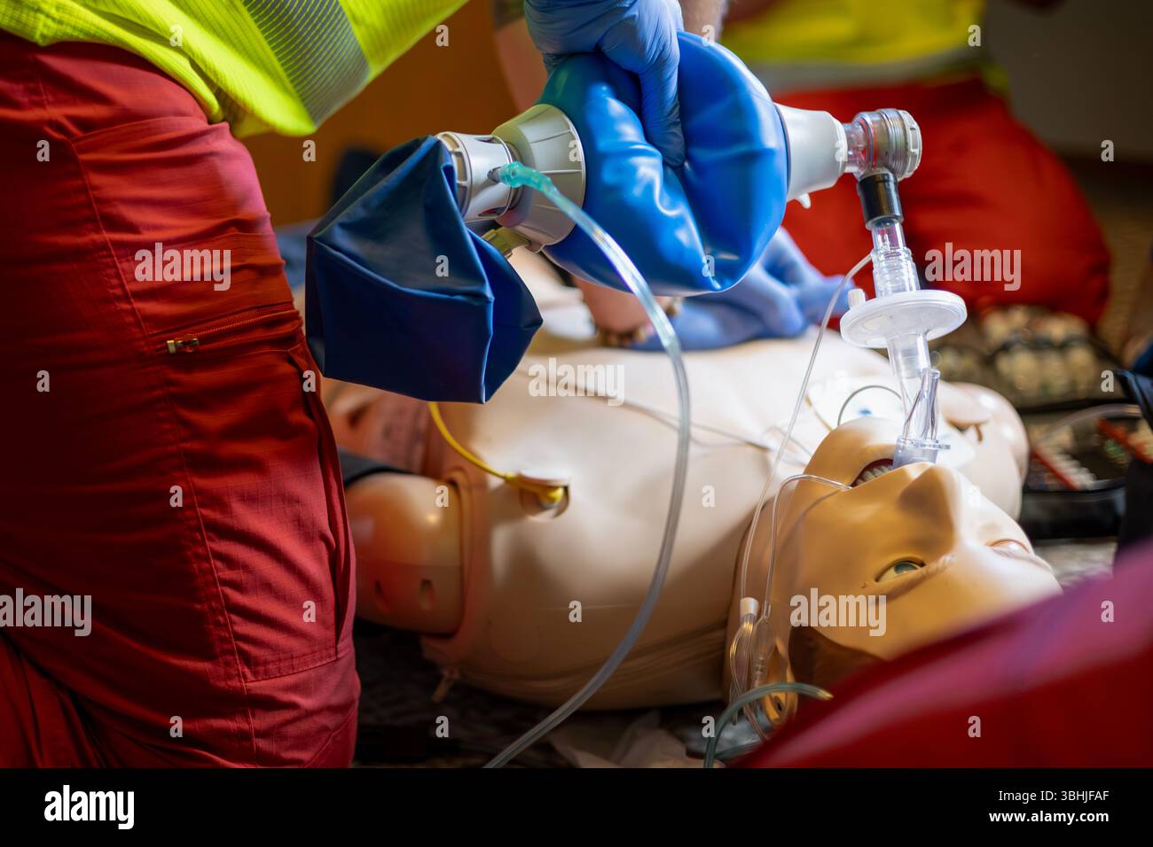 Hands of paramedic and doctor during resuscitation. Team of emergency ...