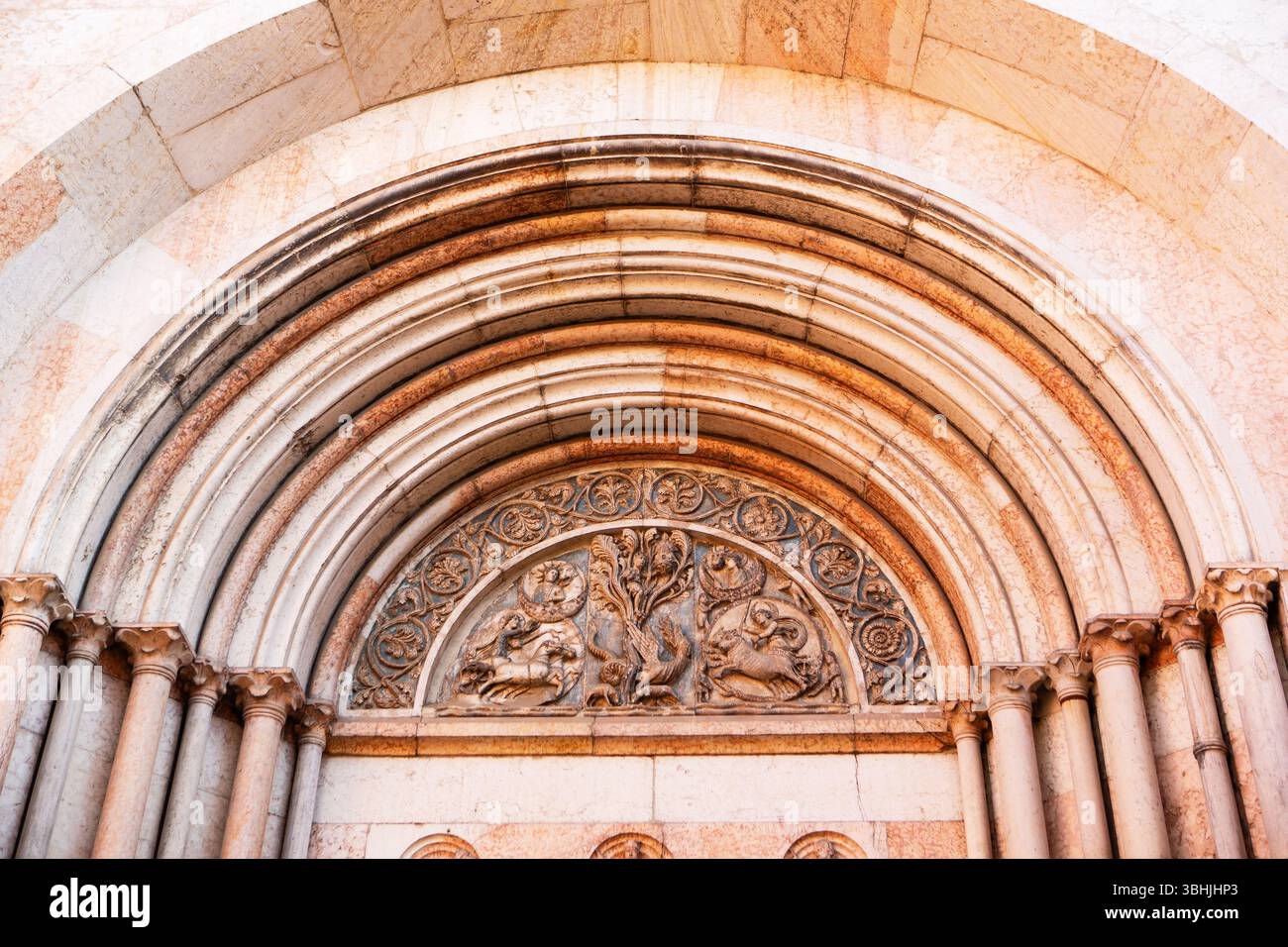 Intricate Romanesque tympanum sculpture at Parma Baptistery features ...