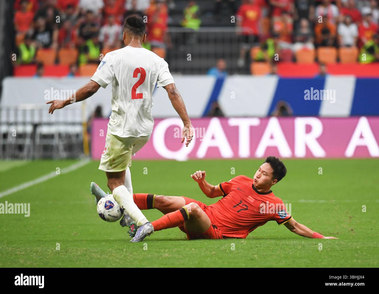 Chongqing, China. 10th June, 2025. Yang Zexiang (R) of China vies with ...